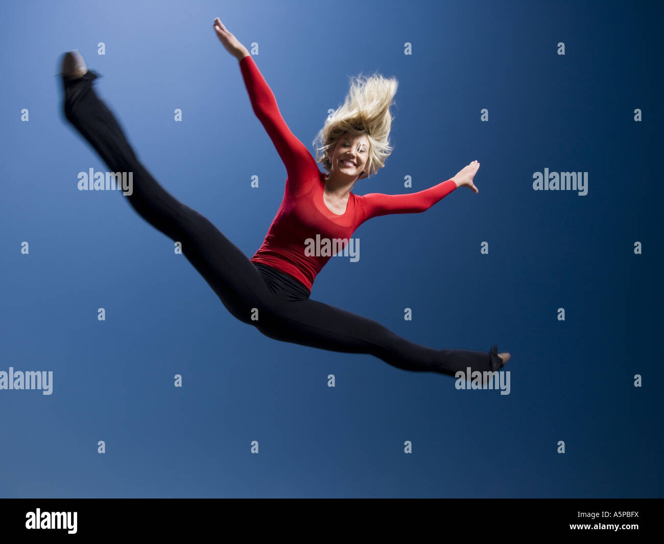 Toe touch jump hi-res stock photography and images - Alamy