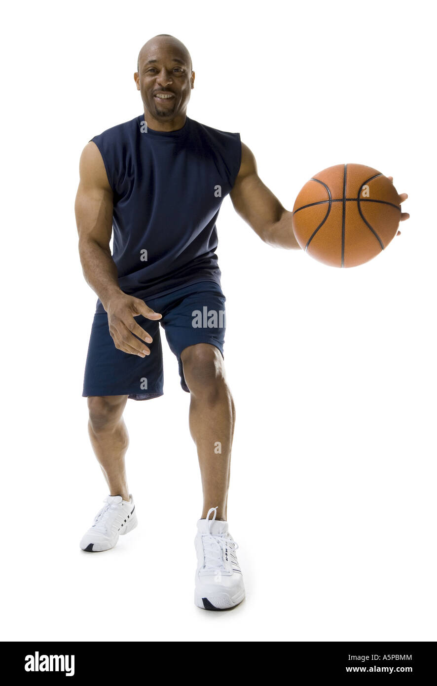 Man playing basketball Stock Photo - Alamy