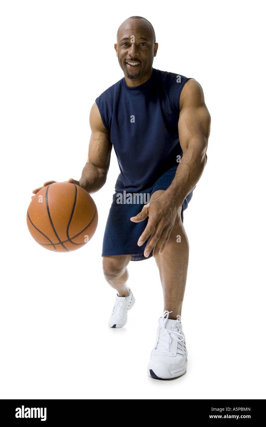 Man playing basketball Stock Photo - Alamy
