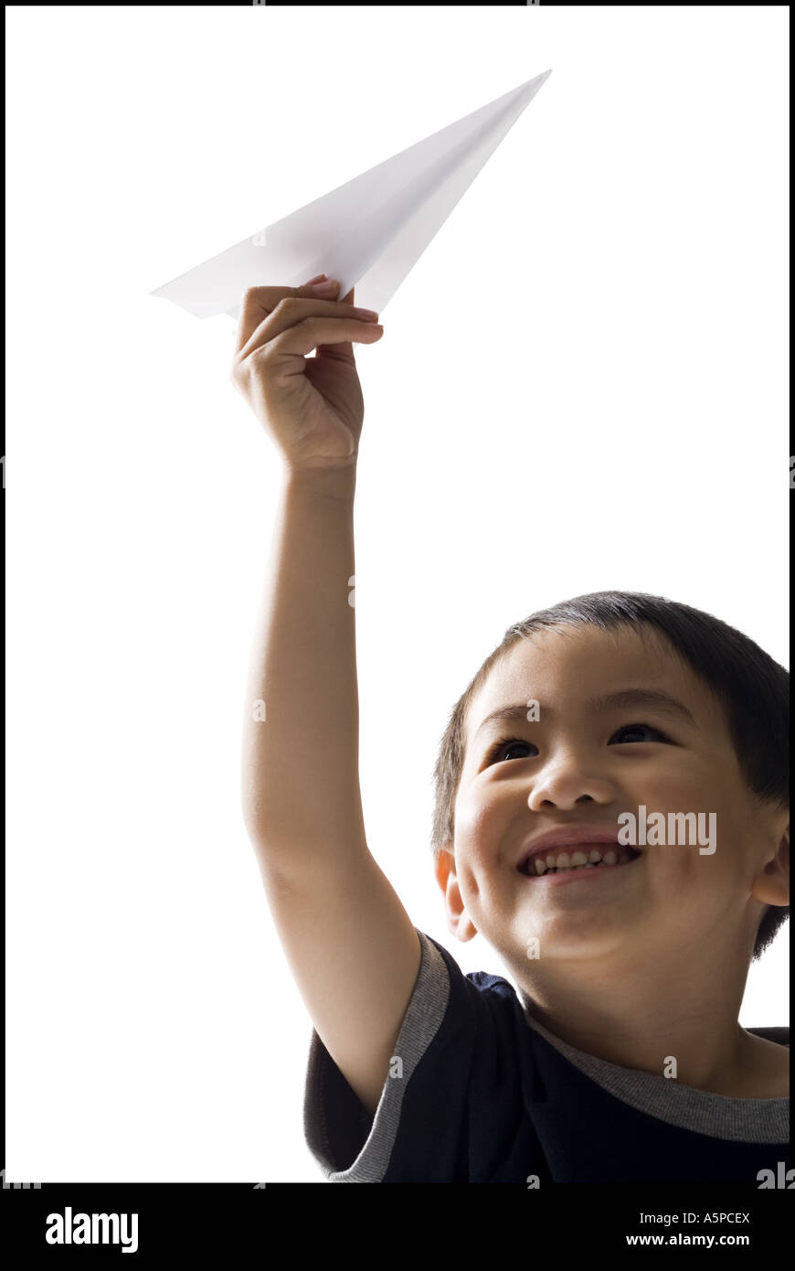 Child playing with paper airplane Stock Photo - Alamy