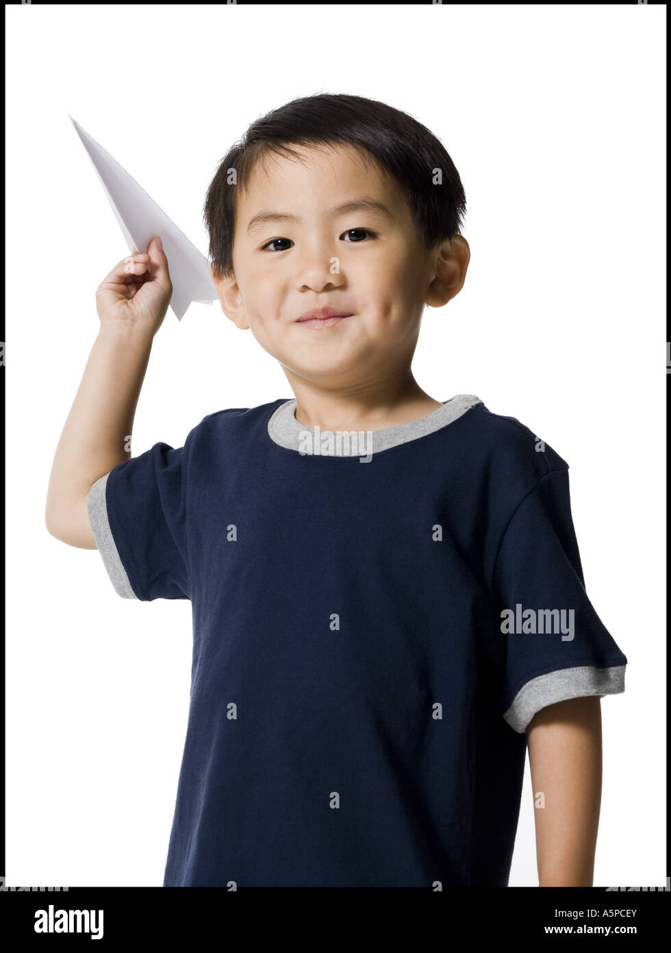 Child playing with paper airplane Stock Photo - Alamy