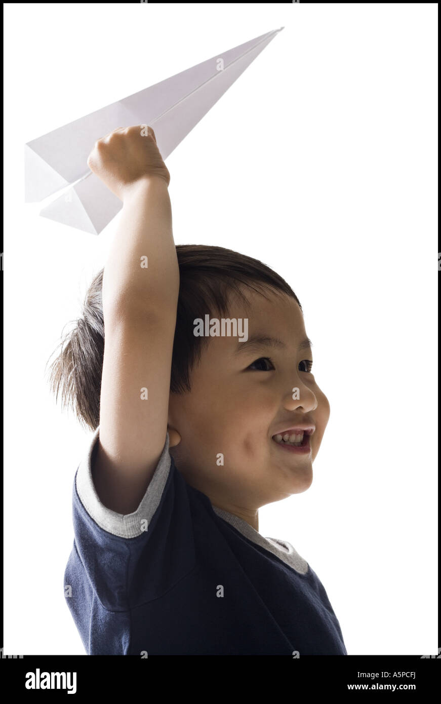 Child playing with paper airplane Stock Photo - Alamy