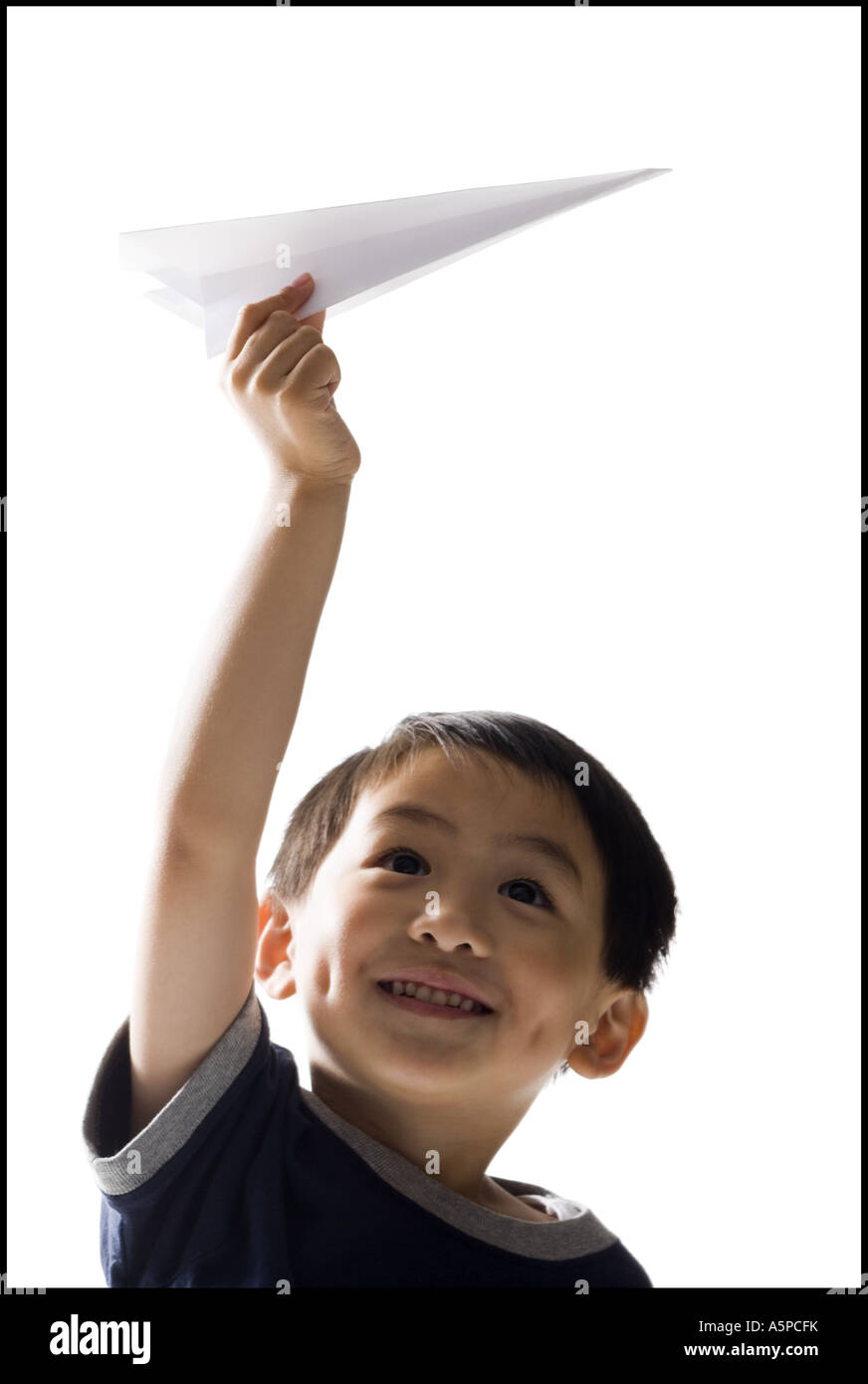 Child playing with paper airplane Stock Photo - Alamy