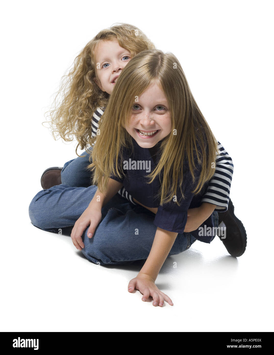 Two girls playing together Stock Photo - Alamy Two girls playing together Stock Photo - Alamy