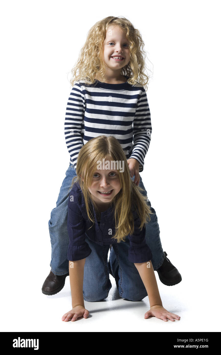 Two girls playing together Stock Photo - Alamy