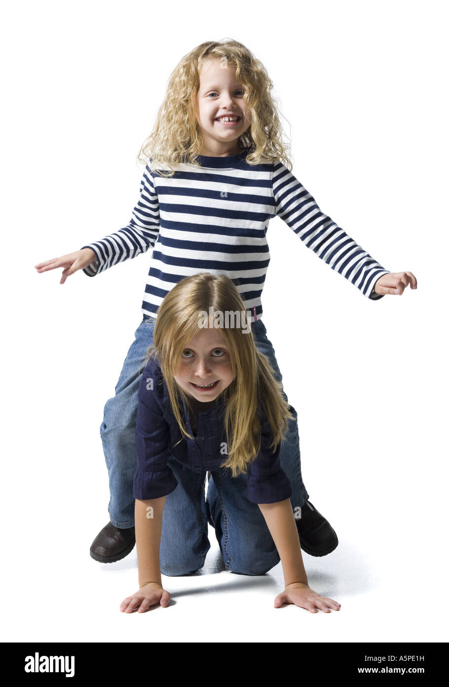 Two girls playing together Stock Photo - Alamy