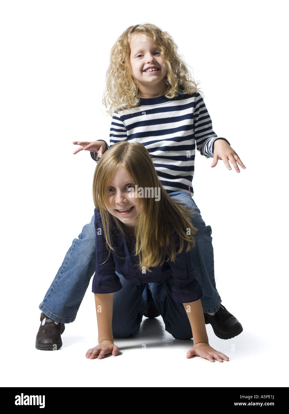 Two girls playing together Stock Photo - Alamy