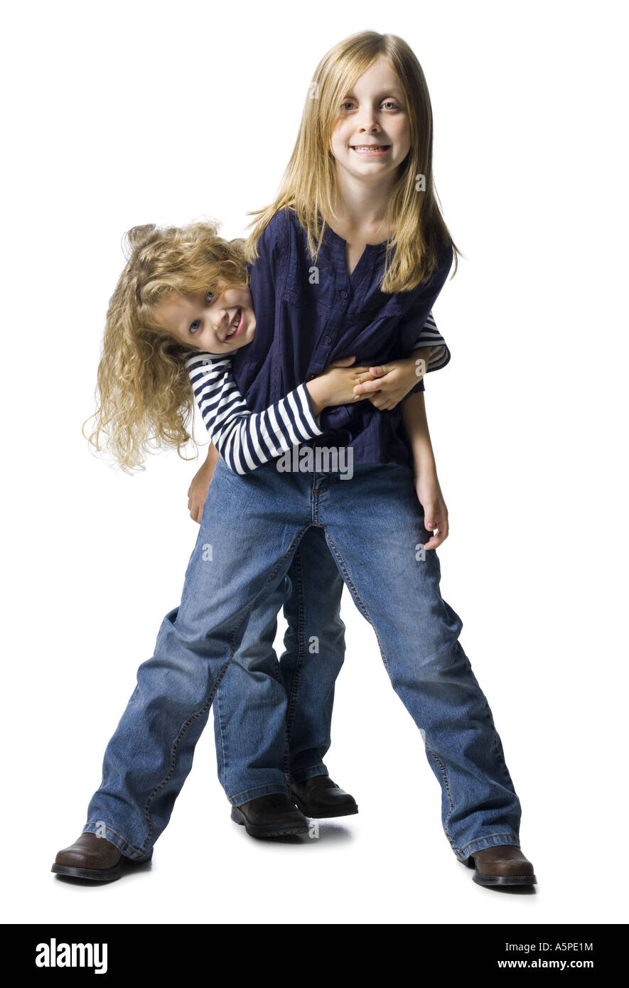 Two girls playing together Stock Photo - Alamy