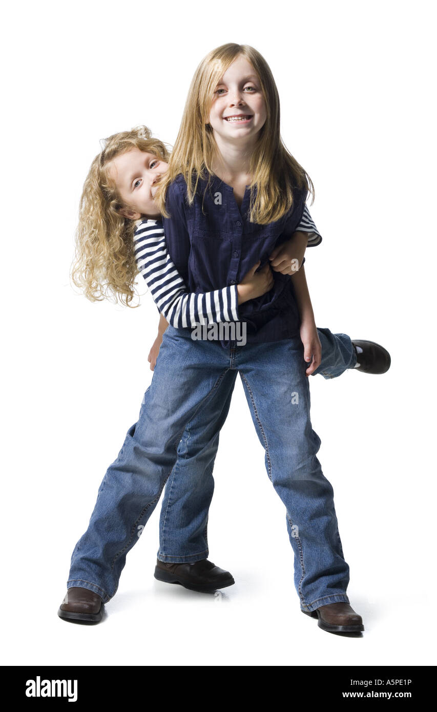 Two girls playing together Stock Photo - Alamy