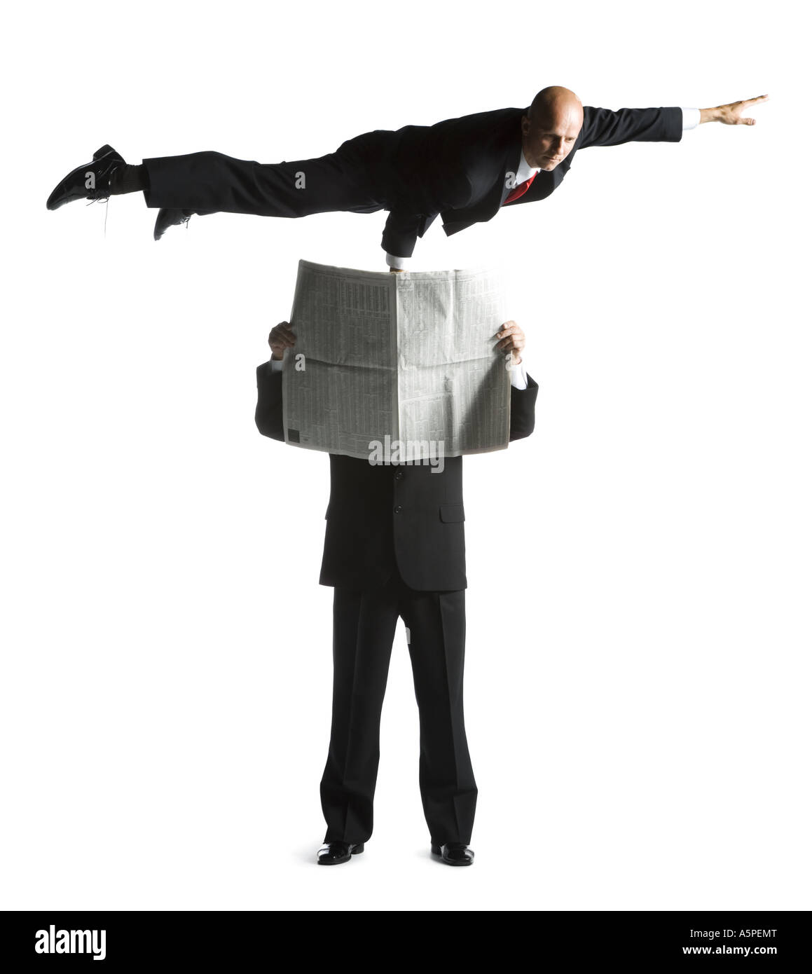 Two male acrobats in business suits performing Stock Photo - Alamy