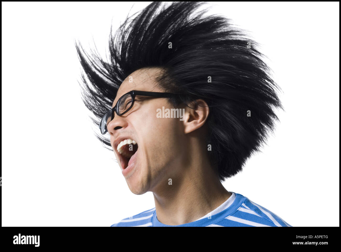Laughing man with wild hair Stock Photo - Alamy