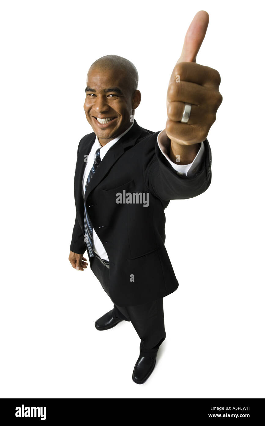 Man giving thumbs up signal Stock Photo - Alamy