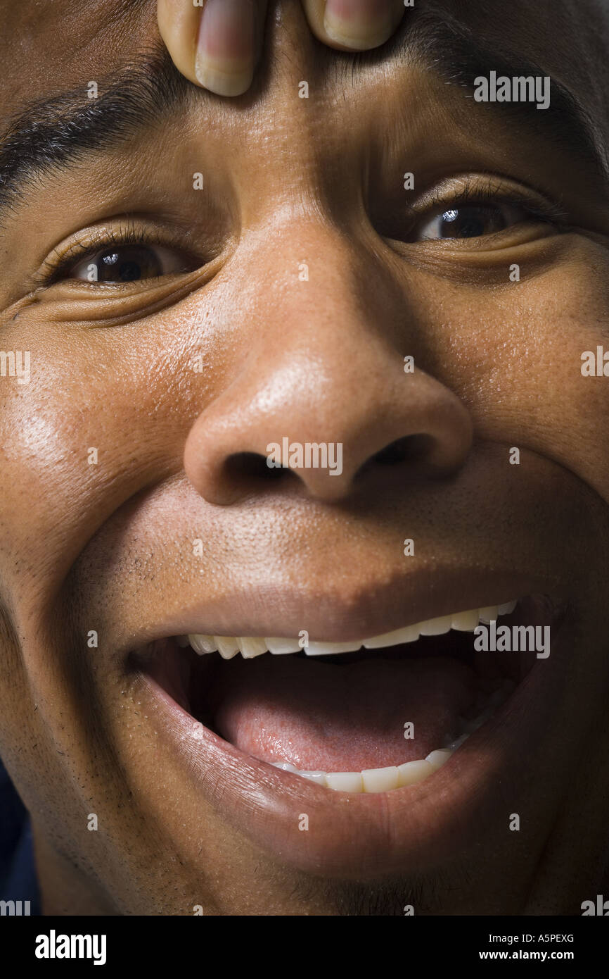 Man making a funny face Stock Photo - Alamy