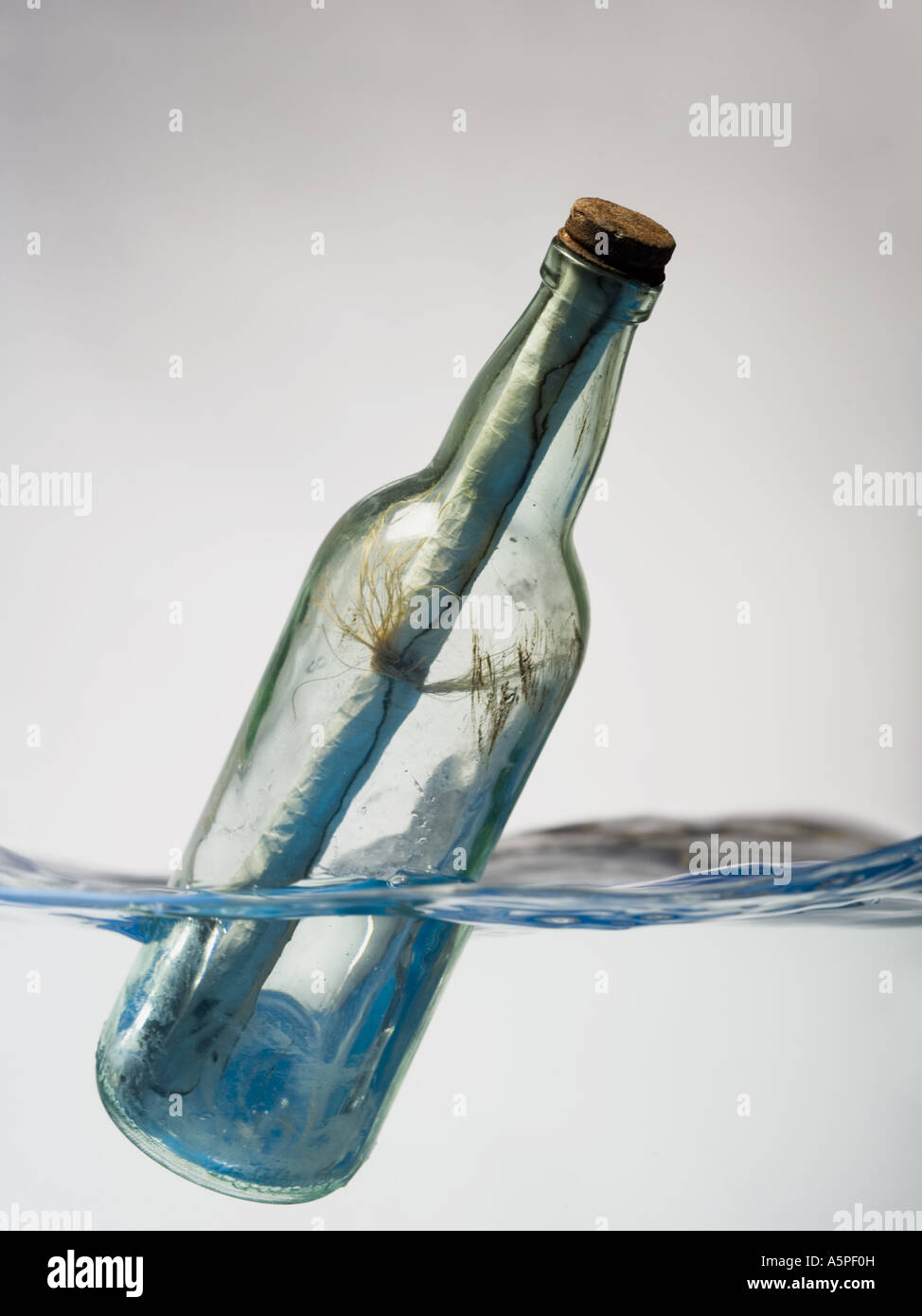 Message in a floating bottle Stock Photo - Alamy