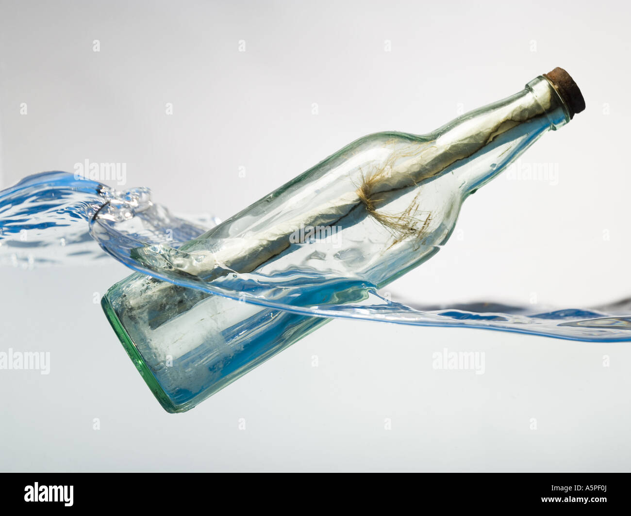 Message in a floating bottle Stock Photo - Alamy