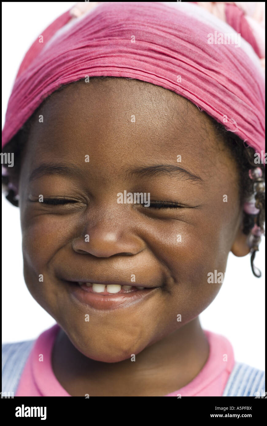 Young girl with pink head scarf Stock Photo - Alamy