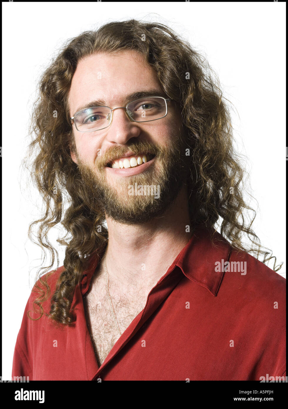 Happy man with long hair and beard Stock Photo - Alamy
