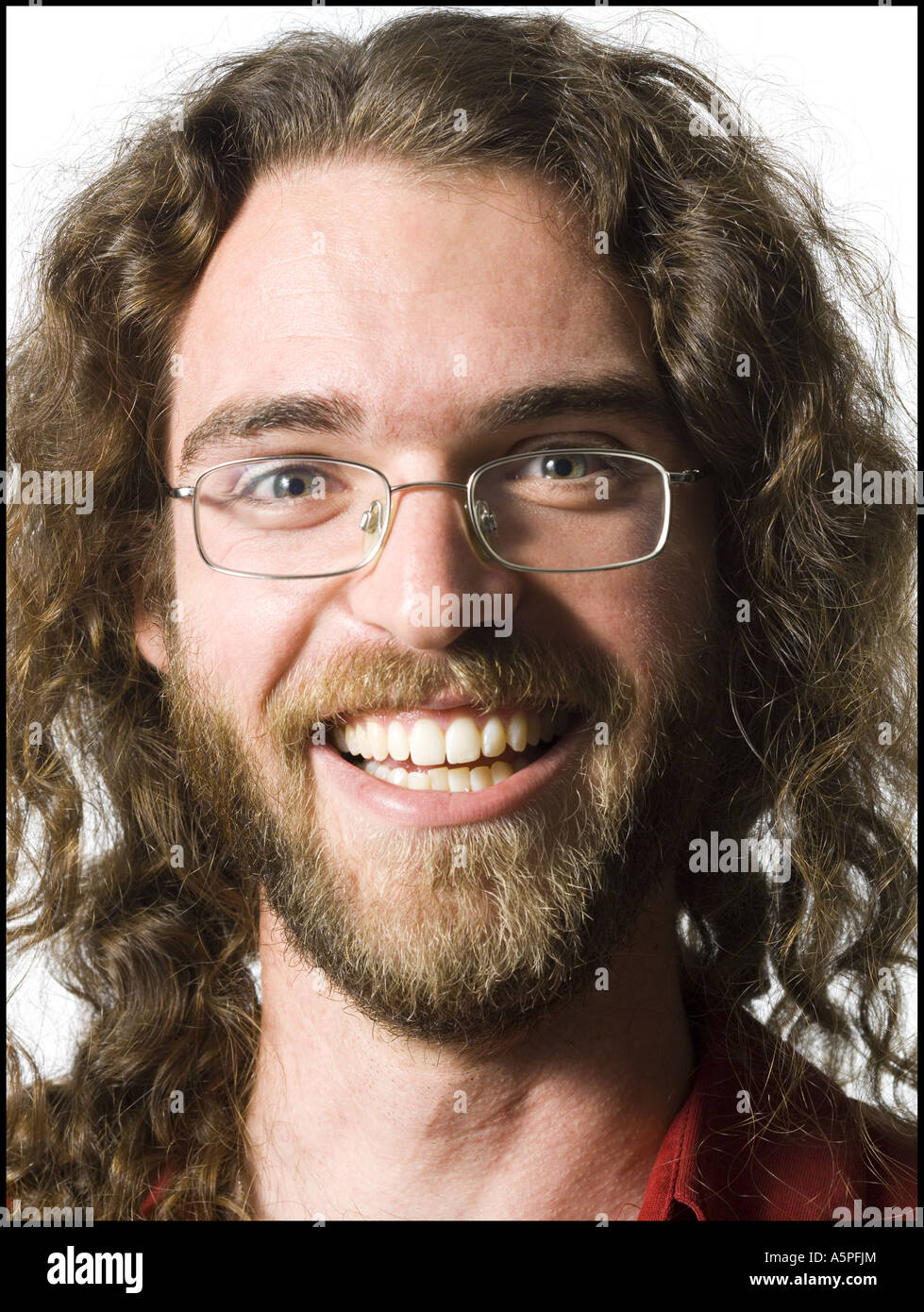 Happy man with long hair and beard Stock Photo - Alamy