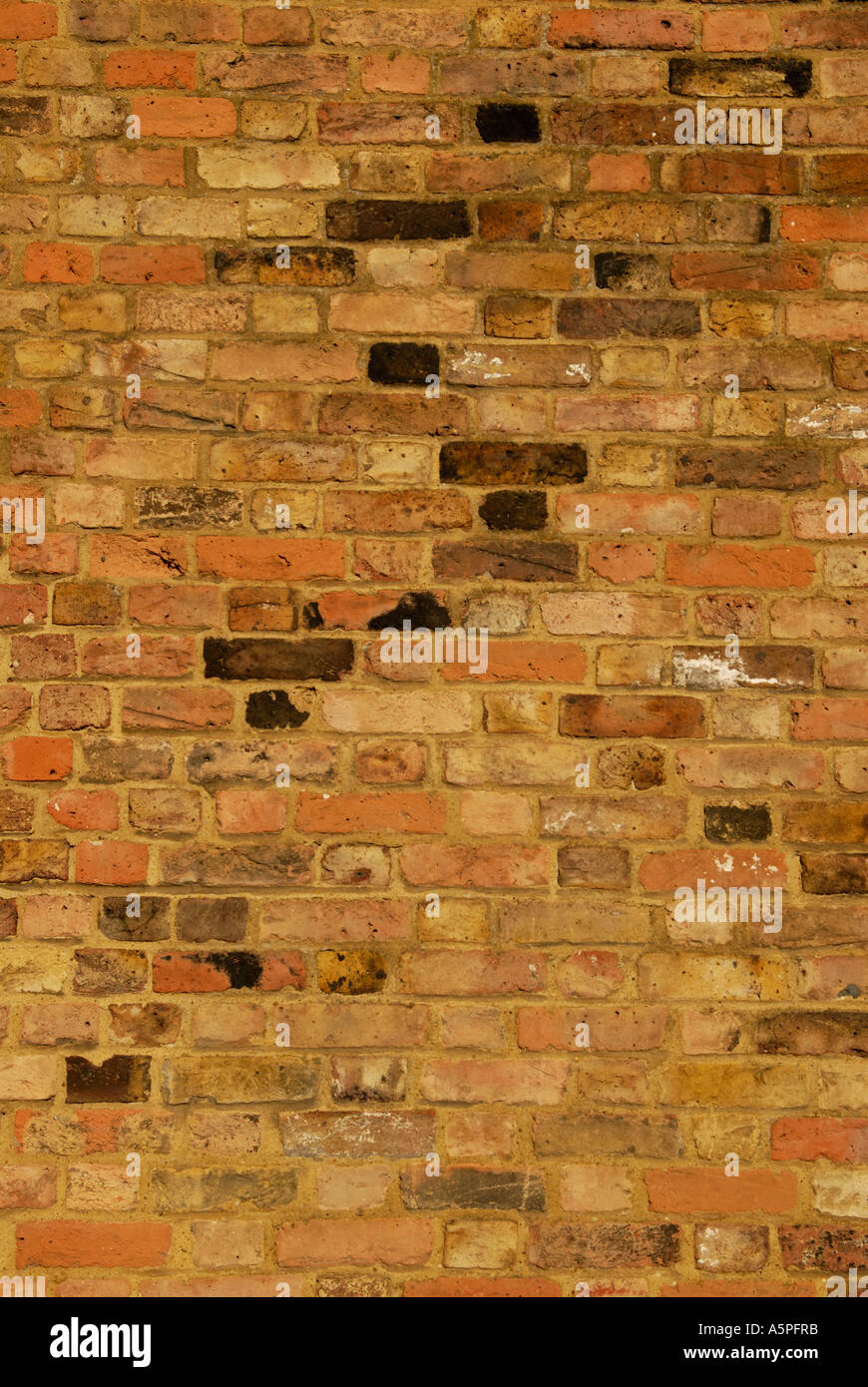 Yellow Red London brick wall Stock Photo - Alamy
