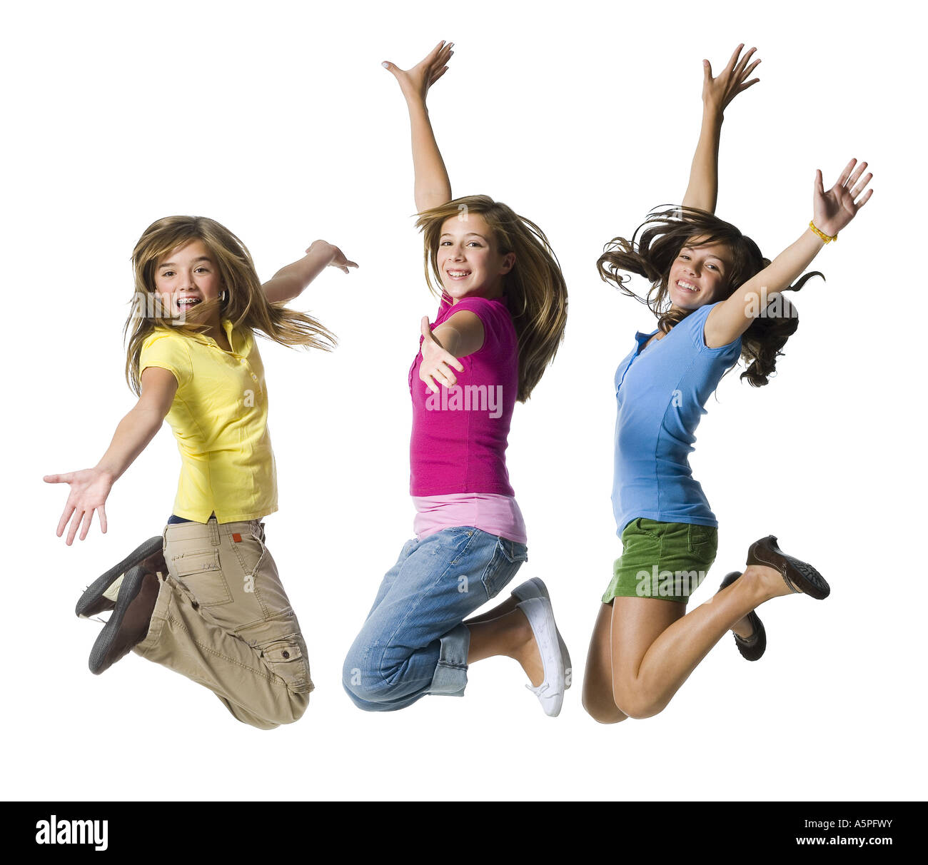 Three girls jumping Stock Photo - Alamy