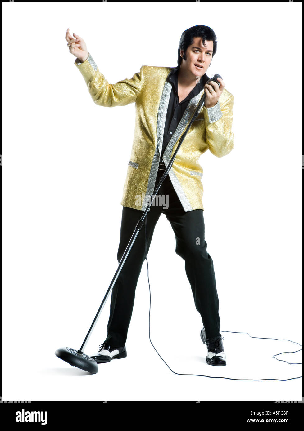 Elvis impersonator singing microphone hi-res stock photography and ...