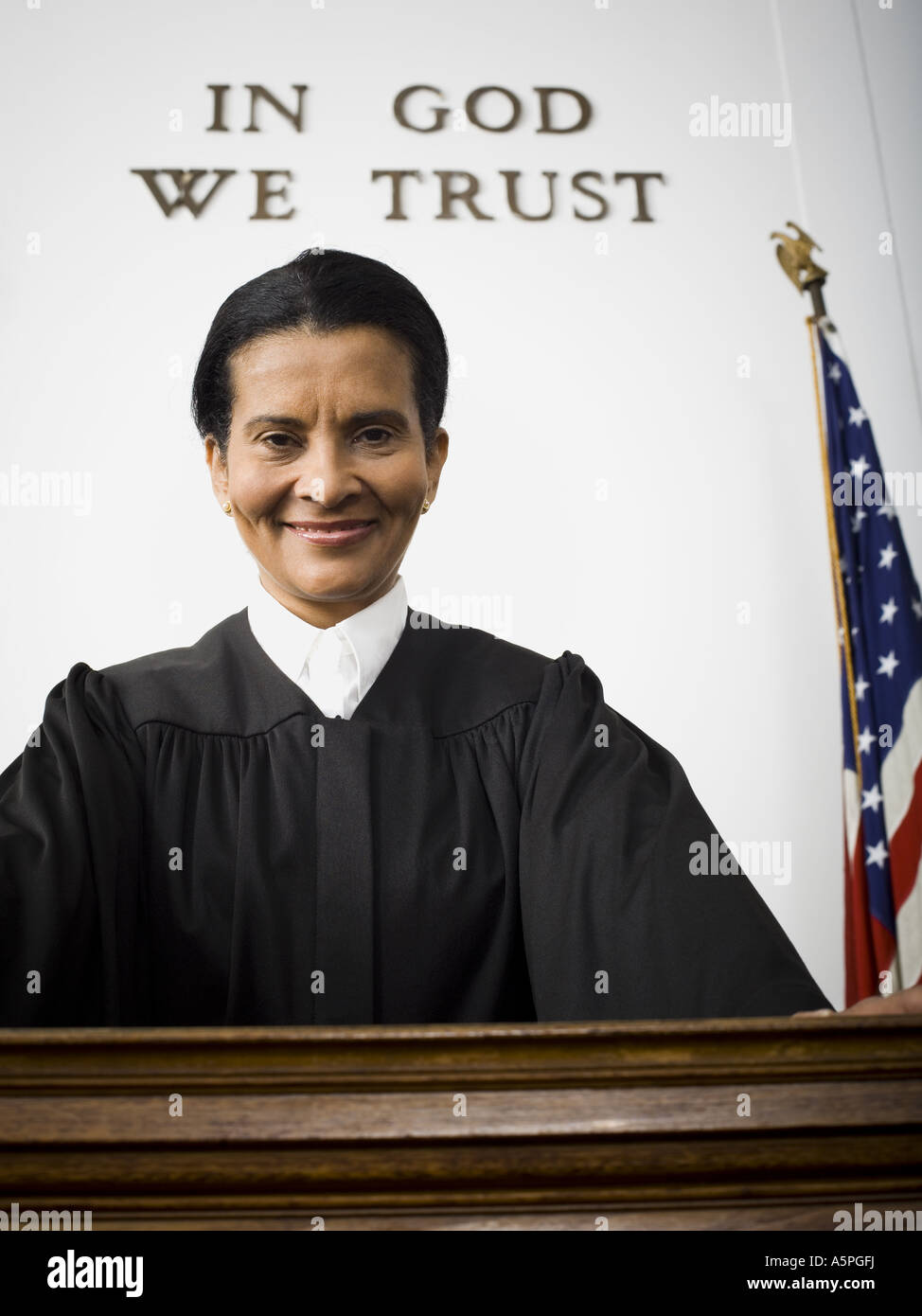 Portrait of a female judge smiling Stock Photo - Alamy