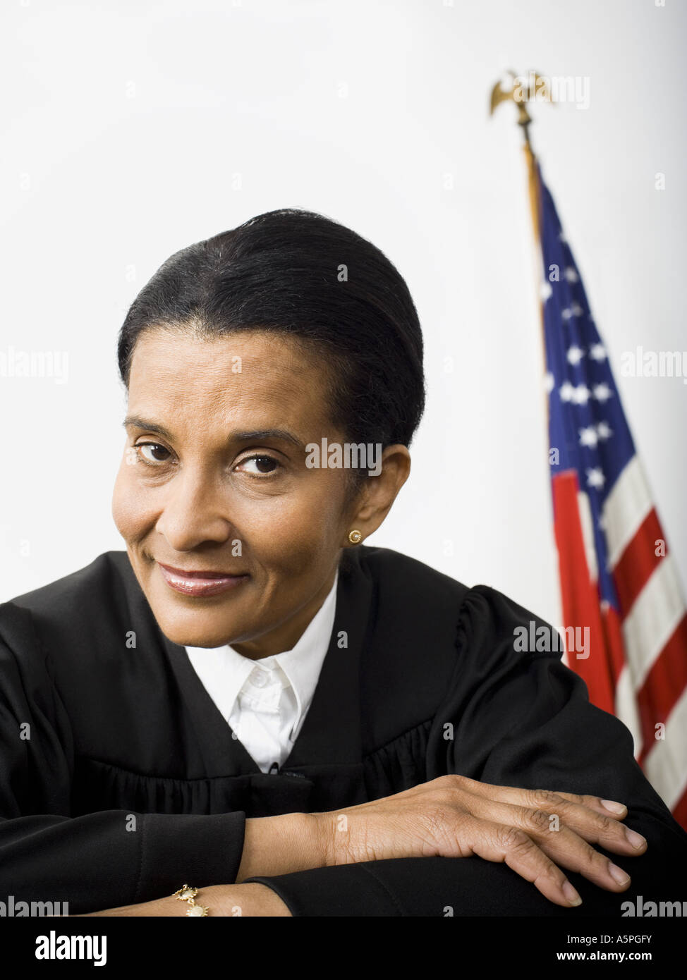Portrait of a female judge smiling Stock Photo - Alamy
