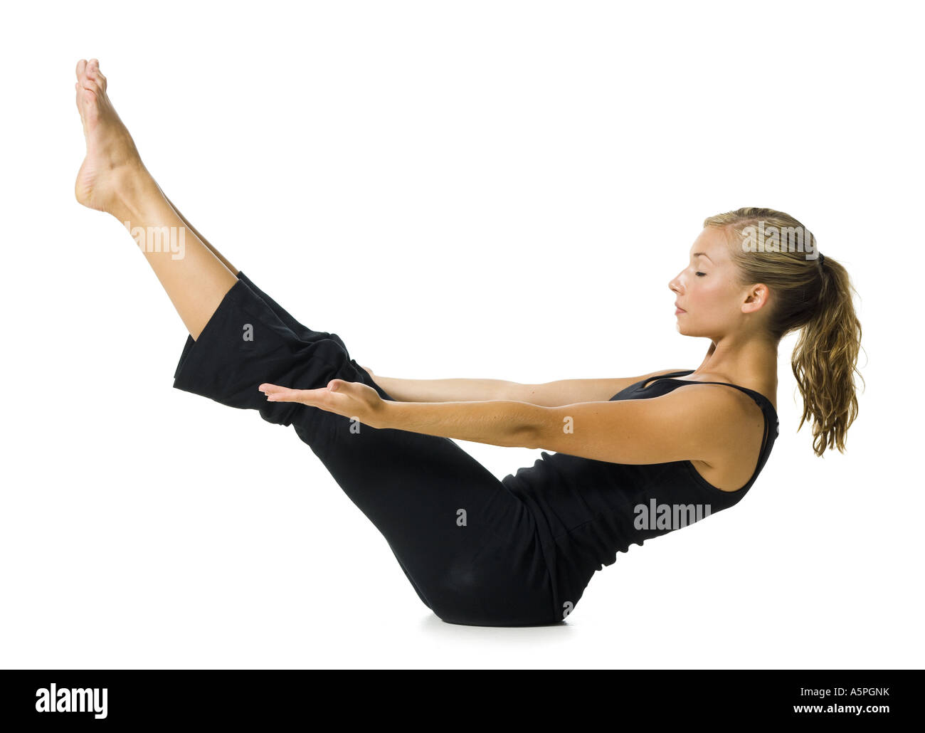 Fit woman stretching and exercising Stock Photo - Alamy