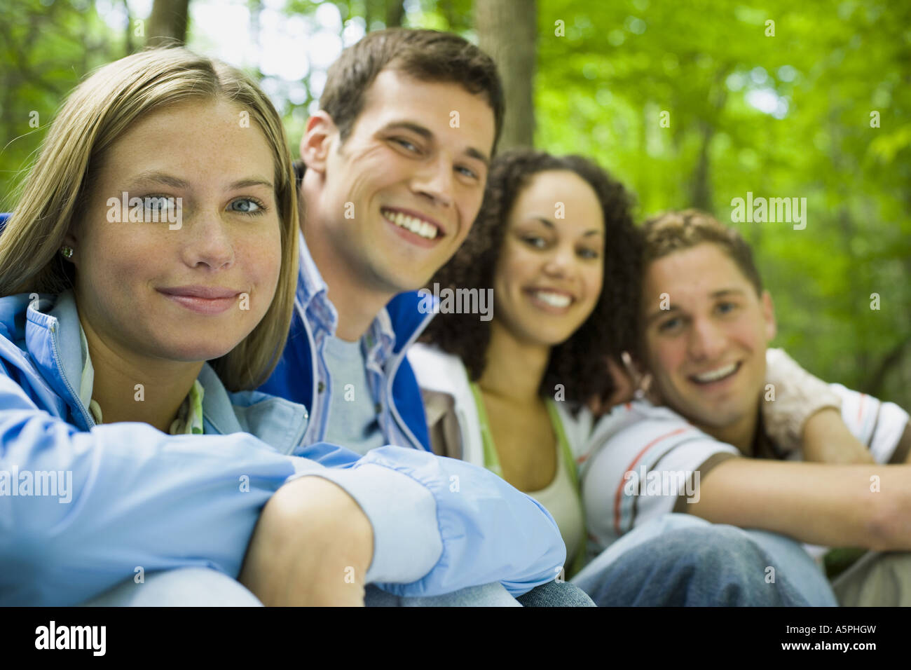 Portrait of two young couples smiling Stock Photo - Alamy