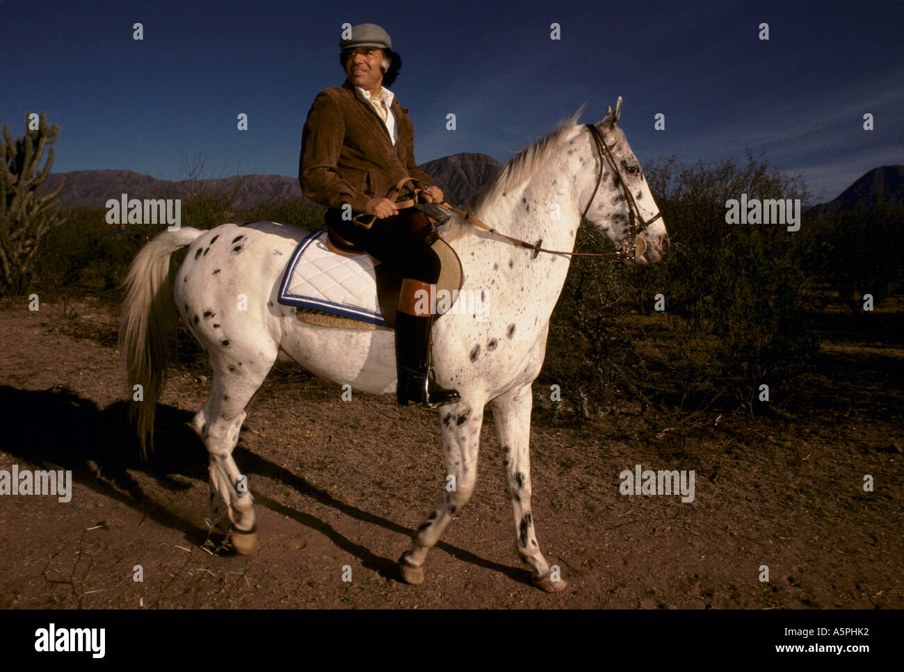 PORTRAIT OF DR CARLOS MENEM PRESIDENT OF ARGENTINA ON HORSEBACK, 1989 ...