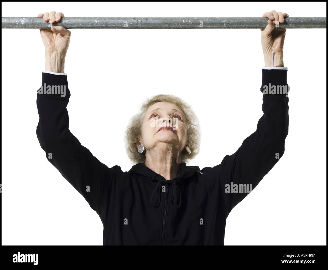 Older woman doing pull up exercises Stock Photo - Alamy