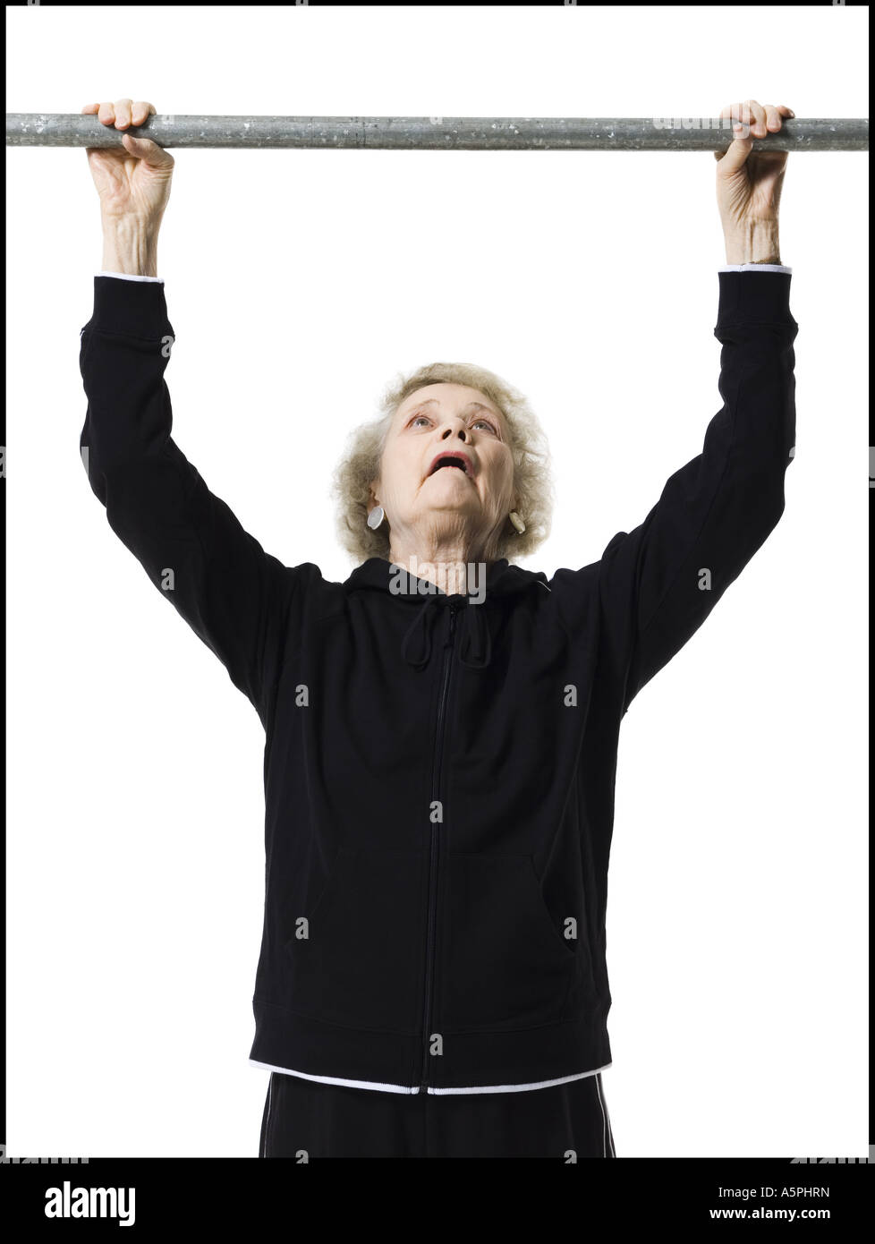 Older woman doing pull up exercises Stock Photo - Alamy