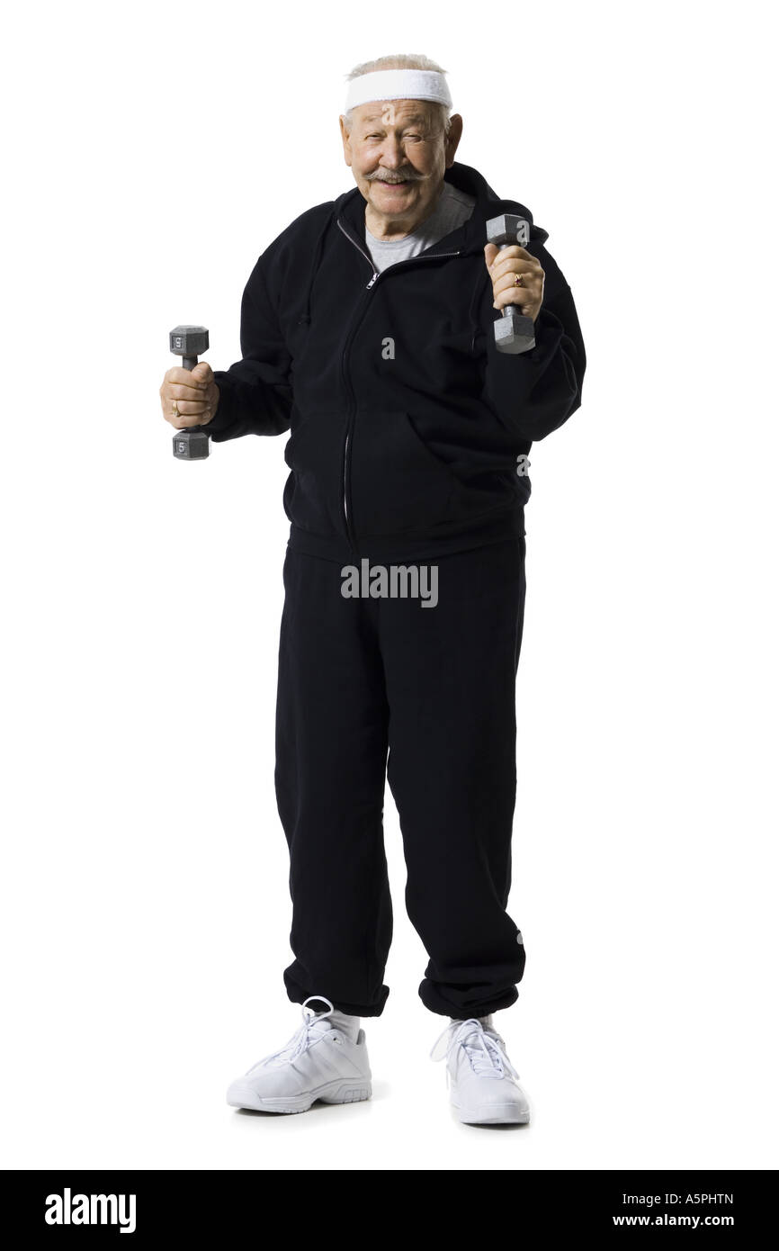 Older man doing dumbbell exercises Stock Photo - Alamy
