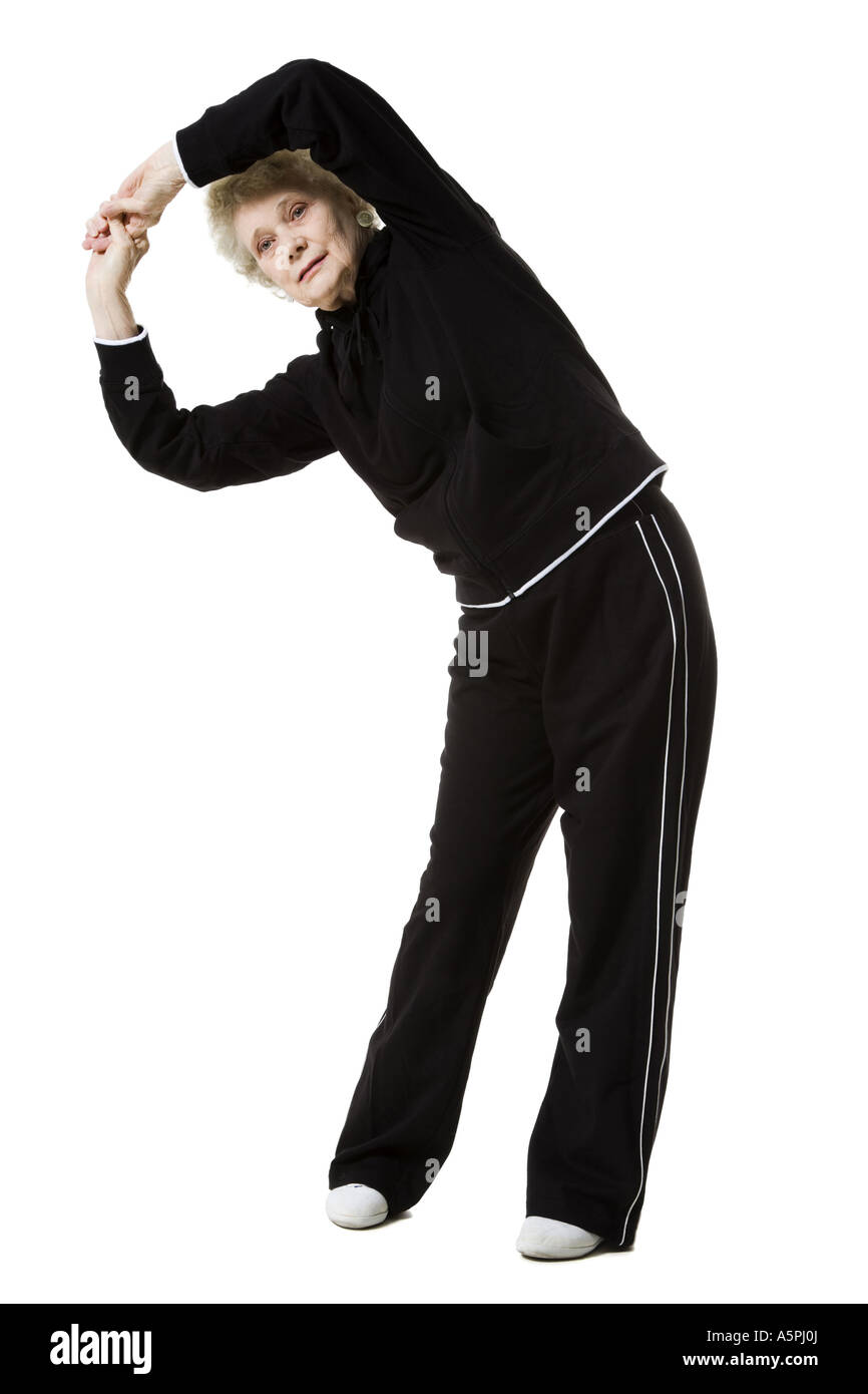 Older woman doing stretching exercises Stock Photo - Alamy
