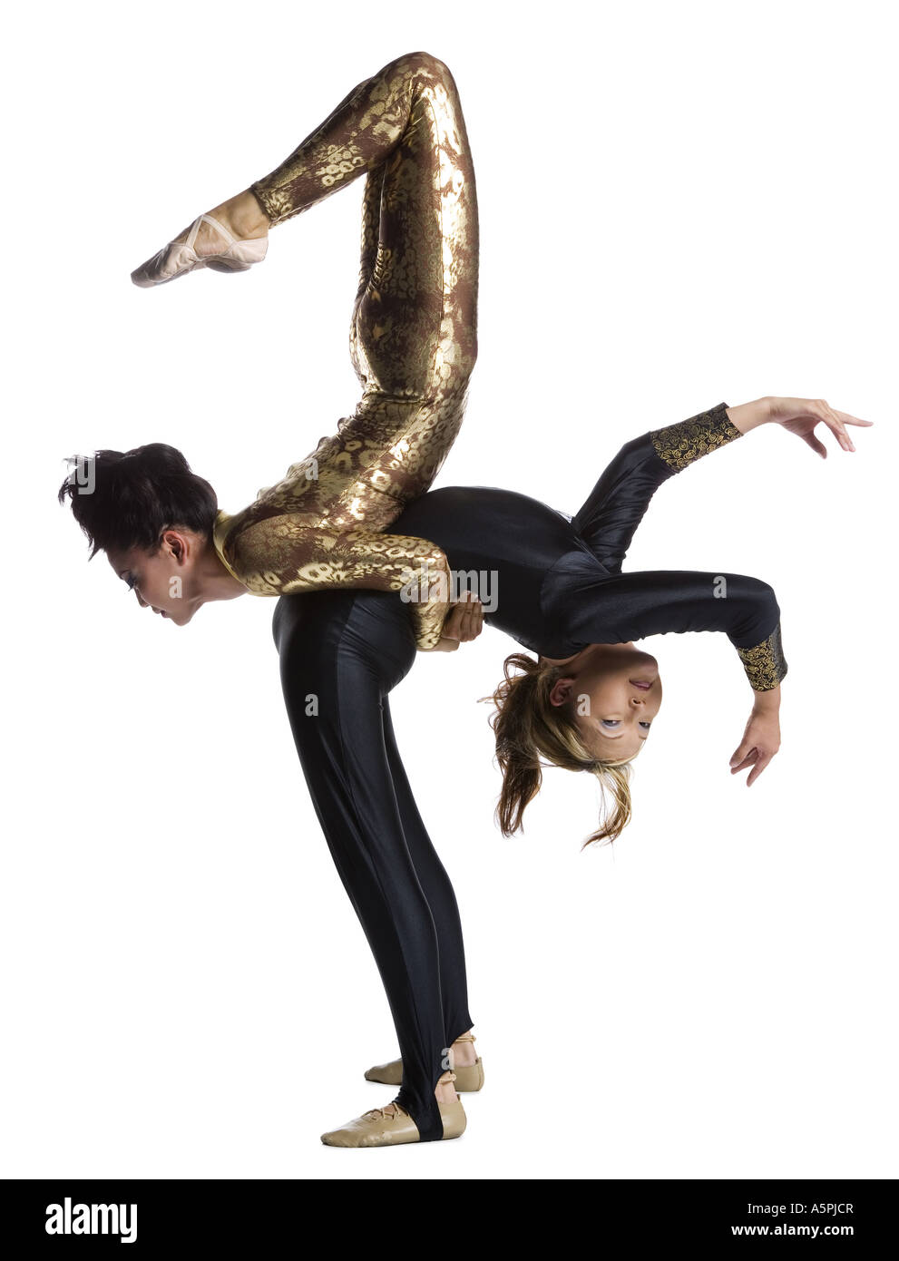 Female contortionist duo performing Stock Photo - Alamy