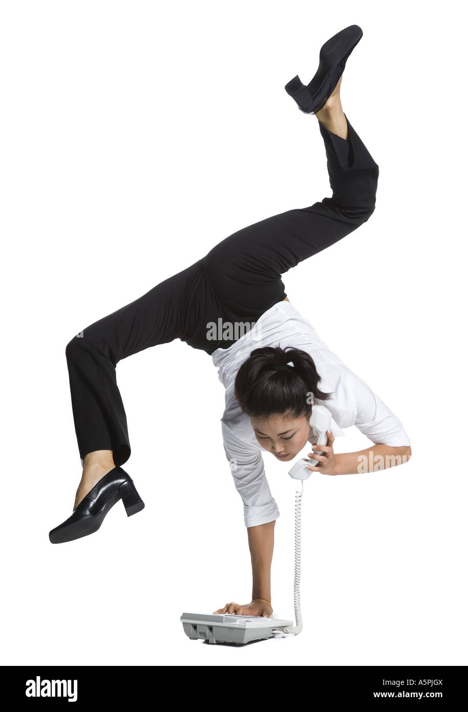 Female contortionist businesswoman Stock Photo - Alamy