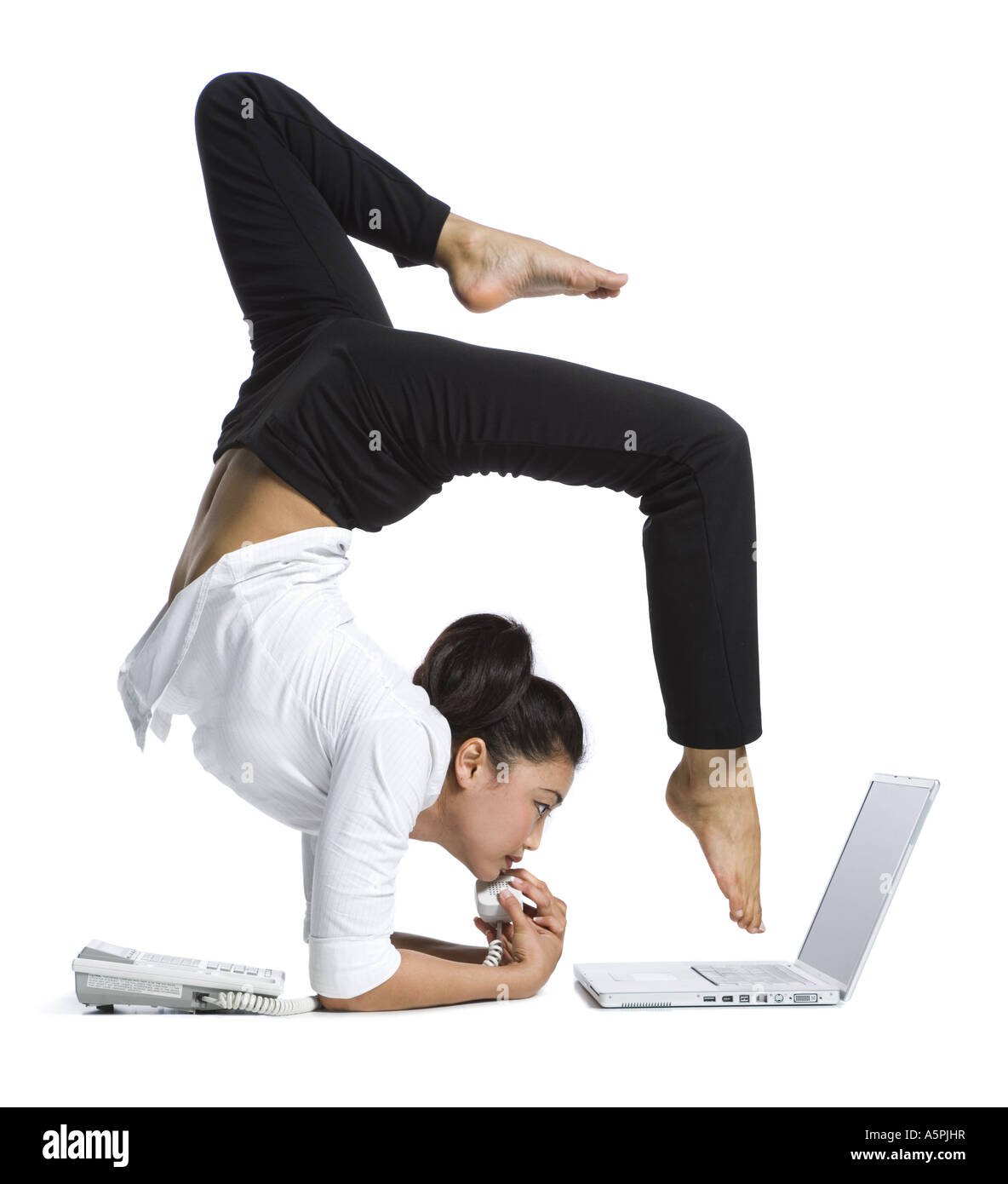 Female contortionist businesswoman Stock Photo - Alamy
