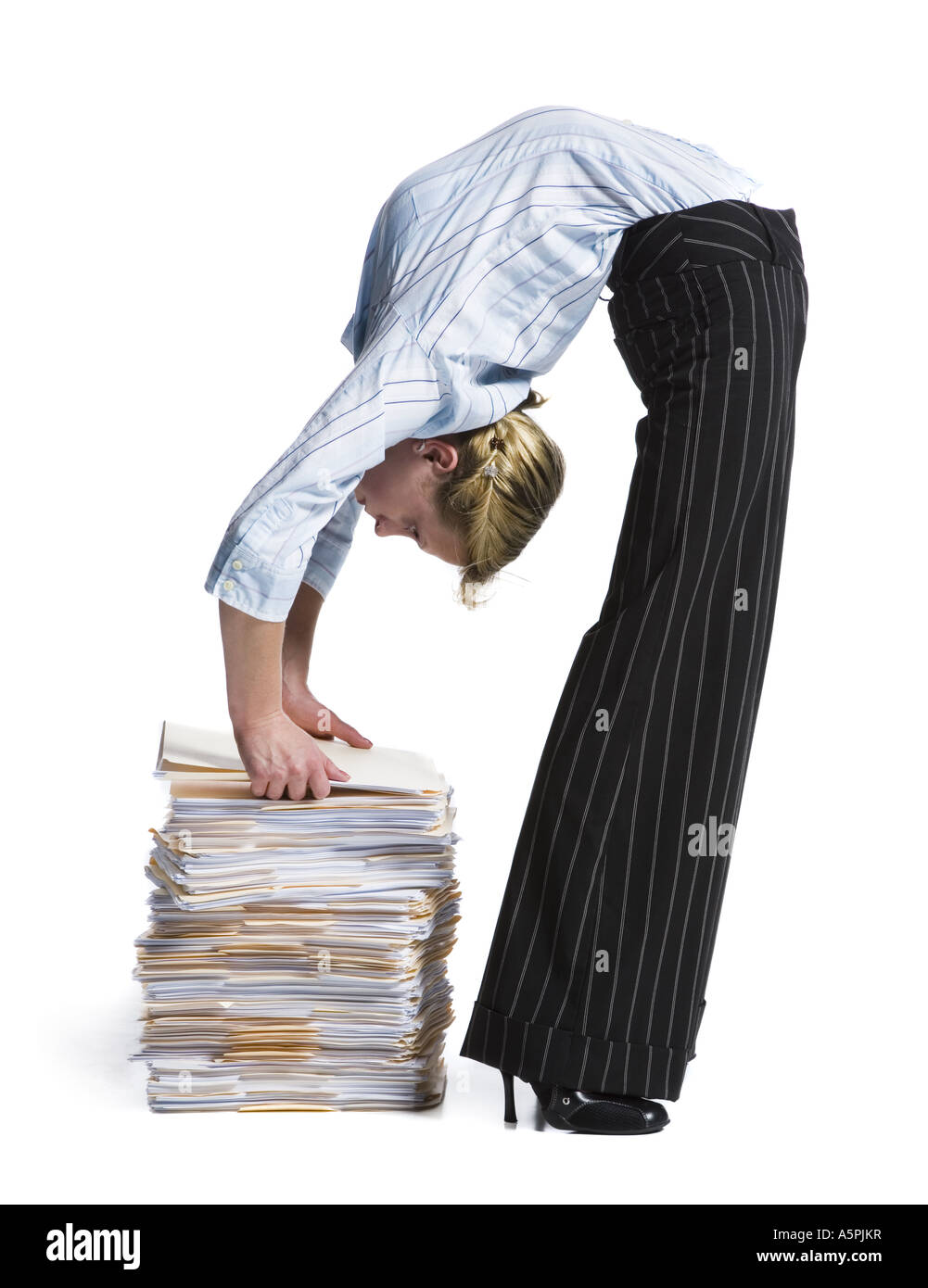 Female contortionist businesswoman bending over backwards Stock Photo ...