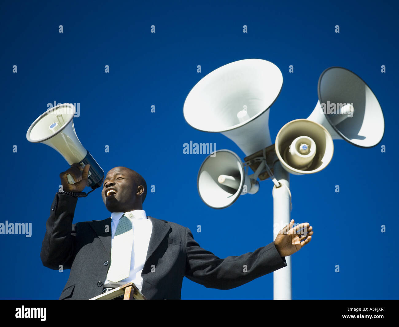 Man Yelling Through Bullhorn High Resolution Stock Photography and ...