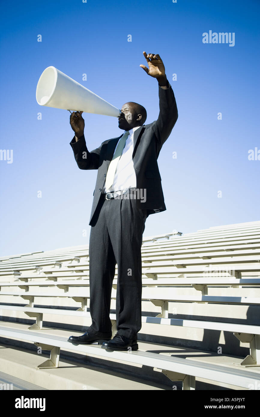 Man yelling through bullhorn hi-res stock photography and images - Alamy
