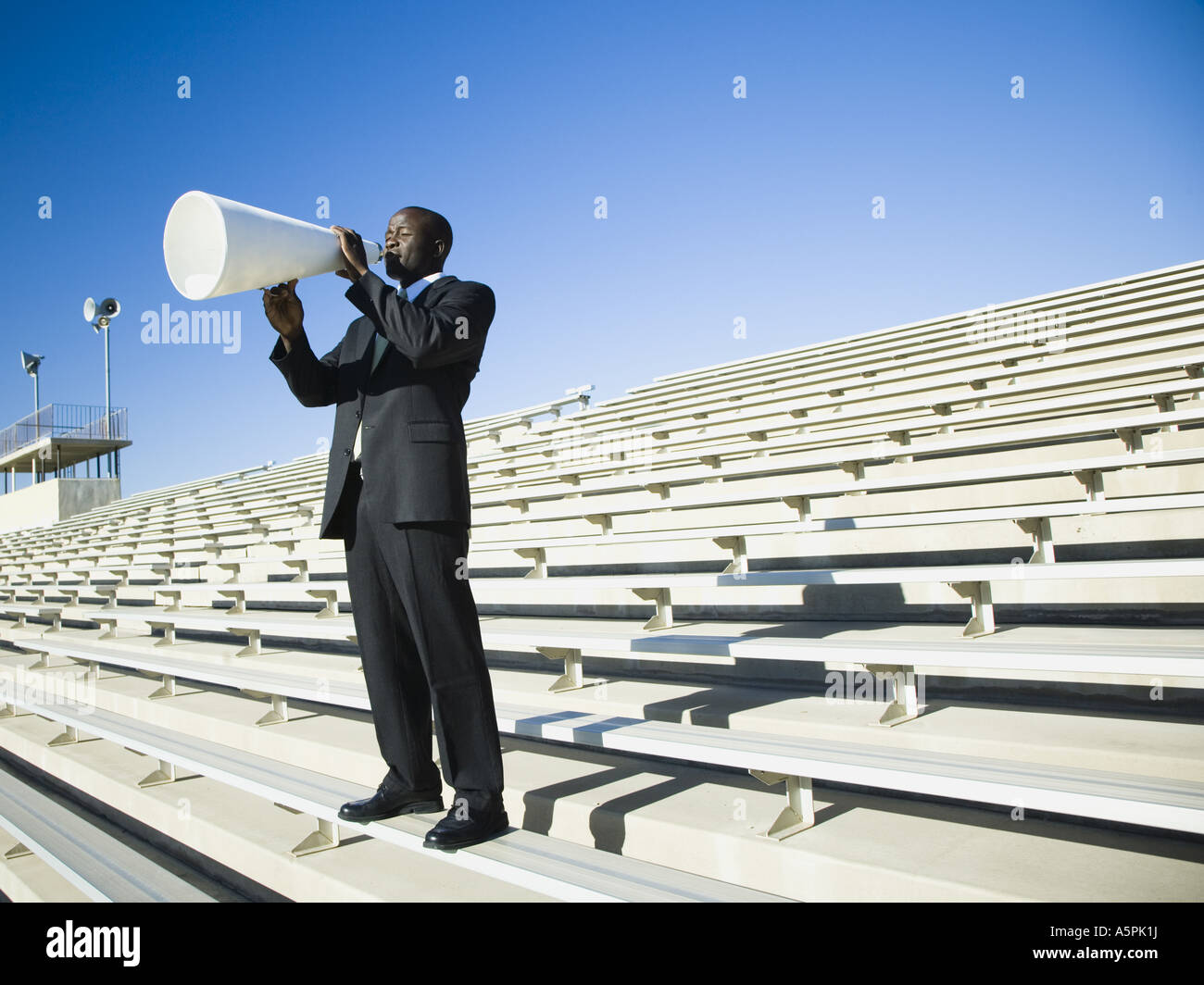 Man yelling through bullhorn hi-res stock photography and images - Alamy