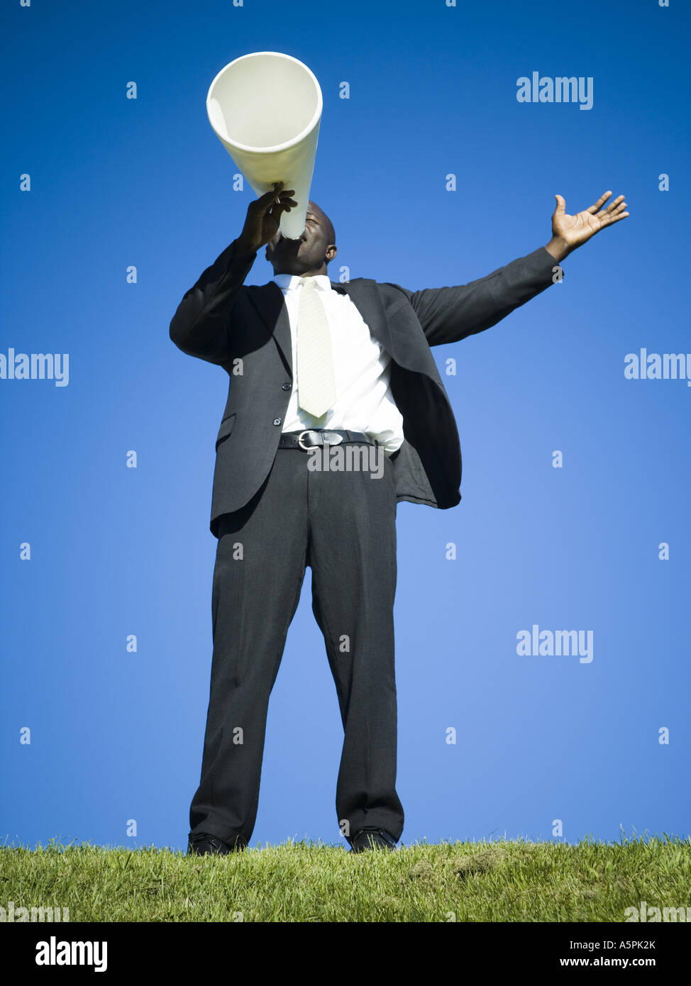 Man yelling through bullhorn hi-res stock photography and images - Alamy