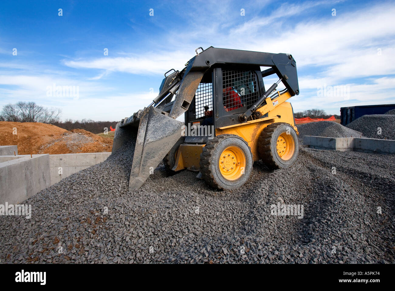 Backhoe at construction site Stock Photo - Alamy