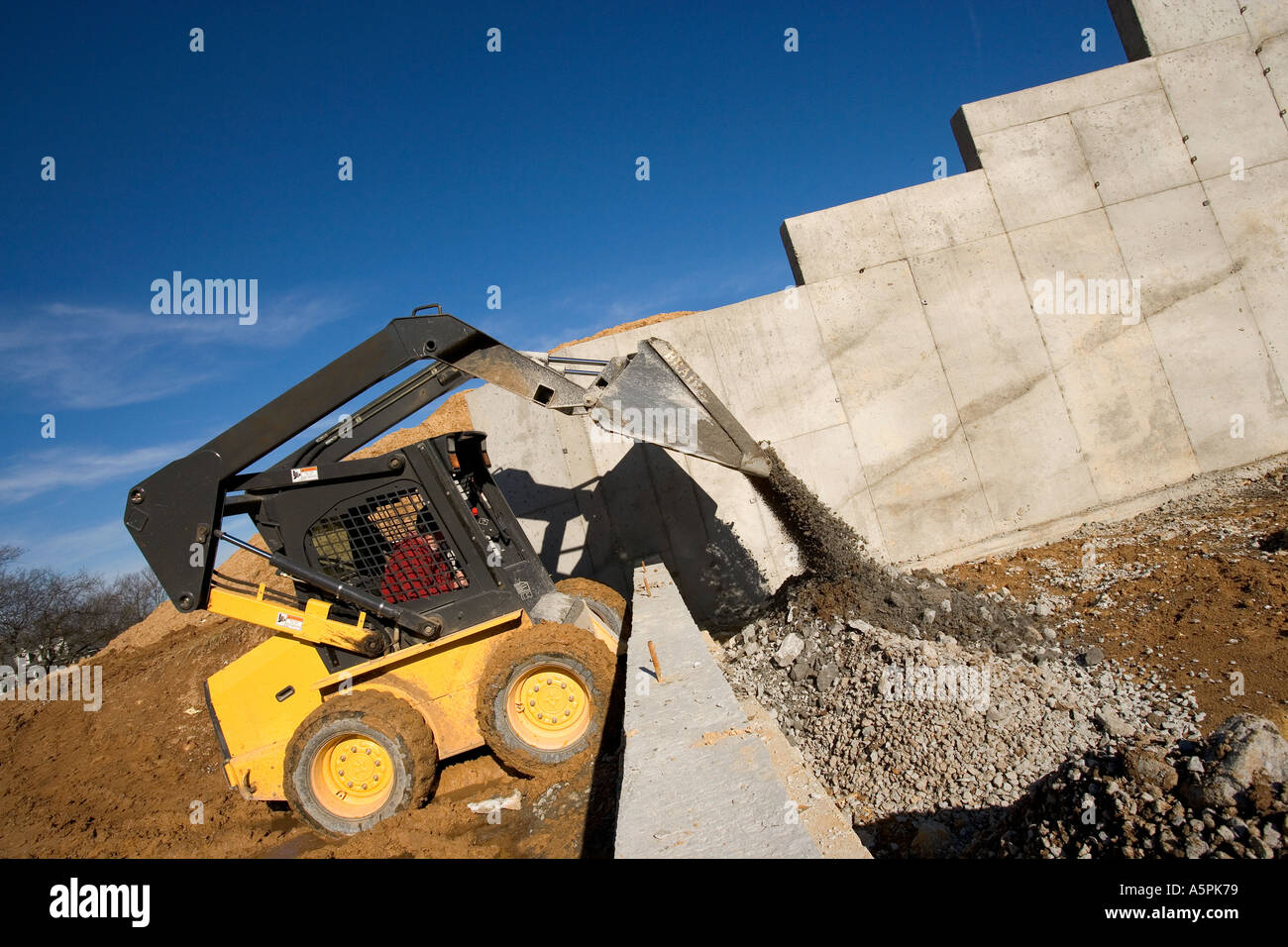 Backhoe at construction site Stock Photo - Alamy