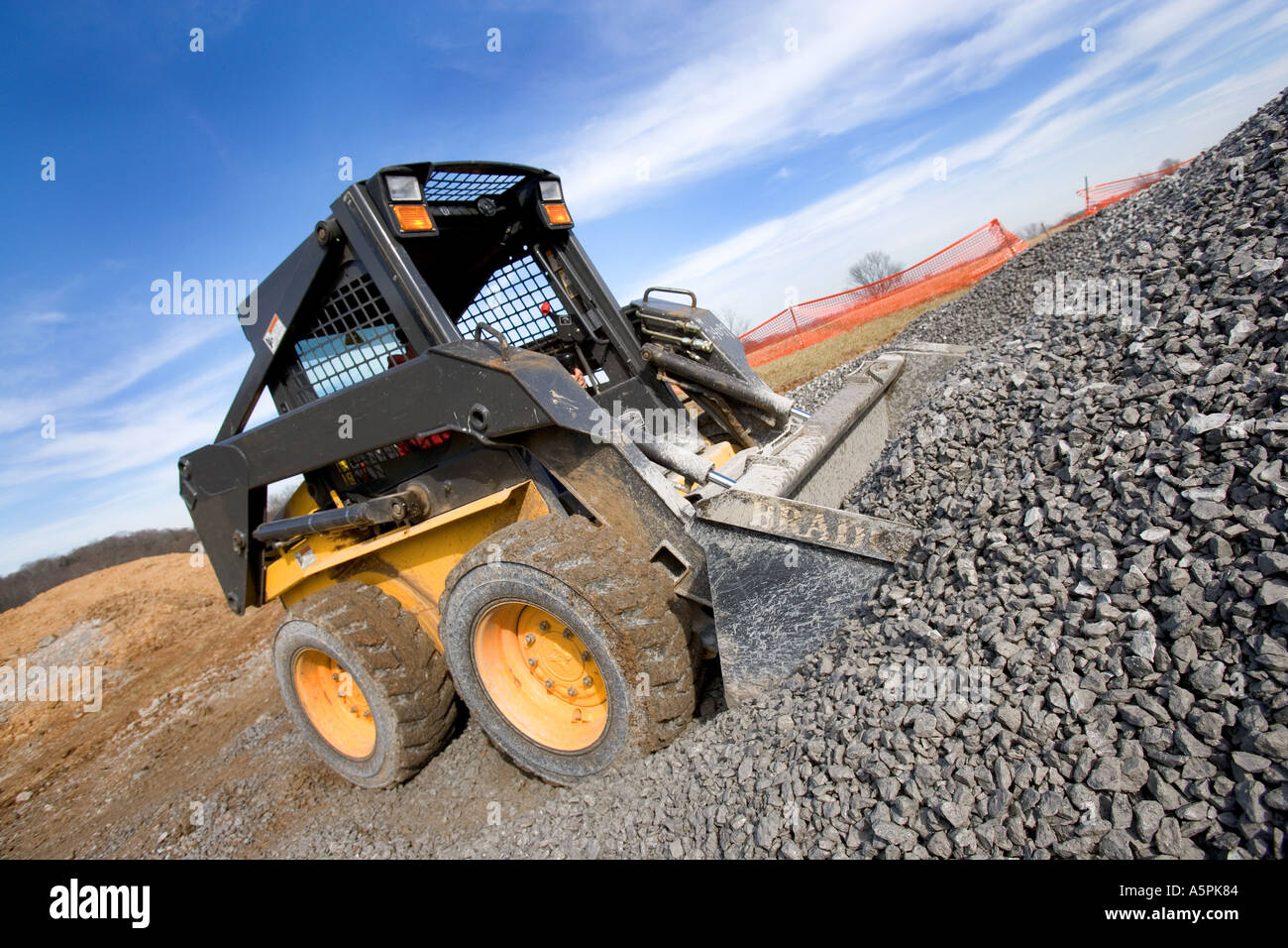 Backhoe at construction site Stock Photo - Alamy