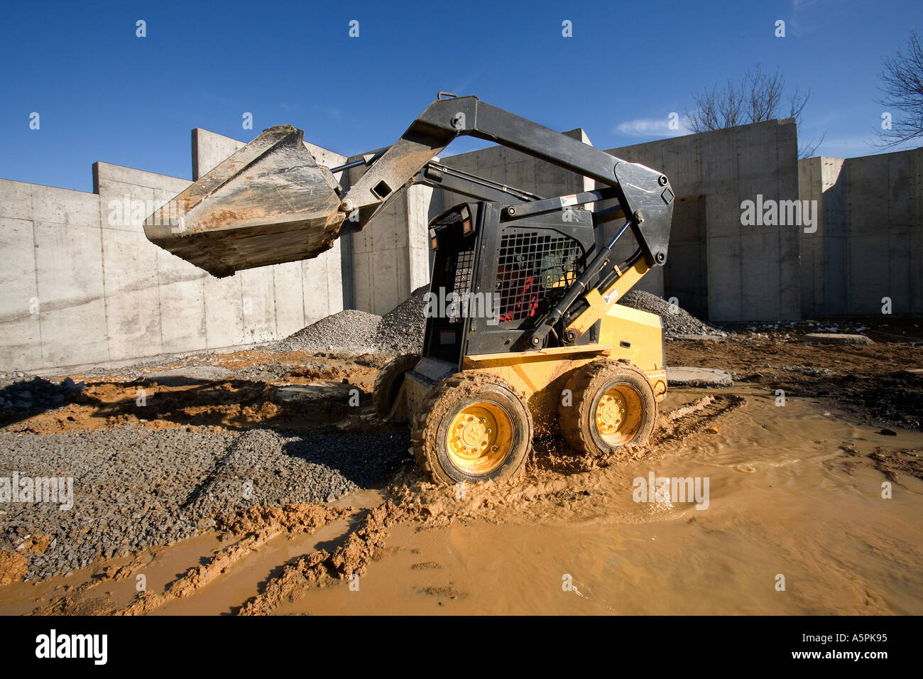 Backhoe loader, construction site Stock Photo - Alamy