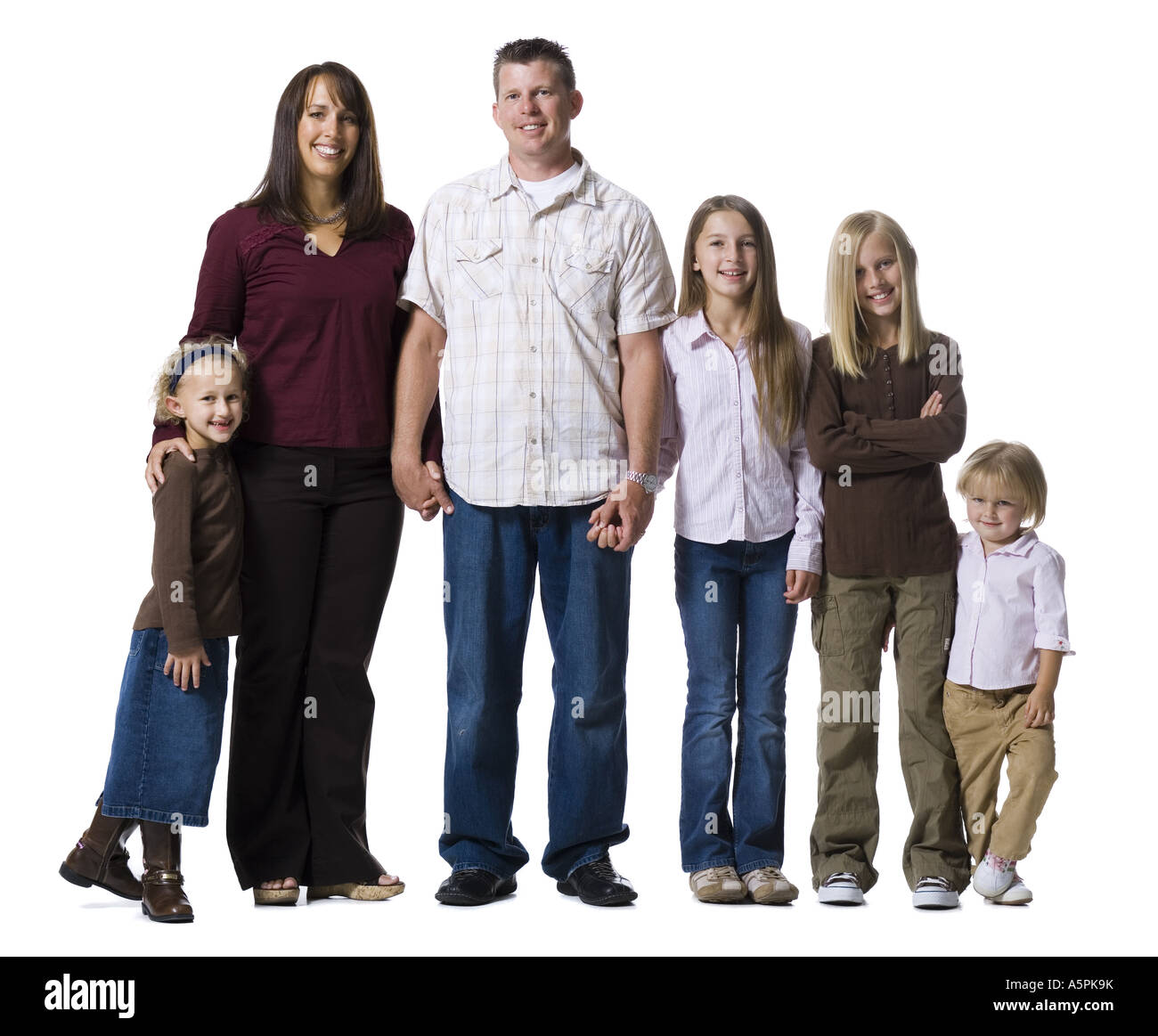 Family portrait of parents and daughters Stock Photo - Alamy