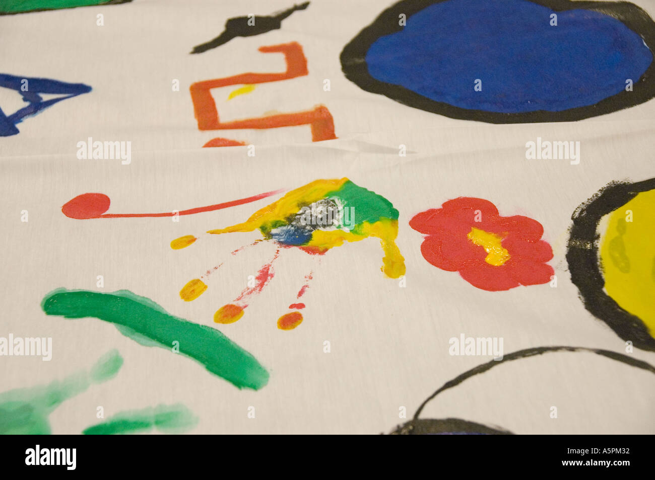 pupils of a 4th class in primary school painting on cloth Stock Photo ...