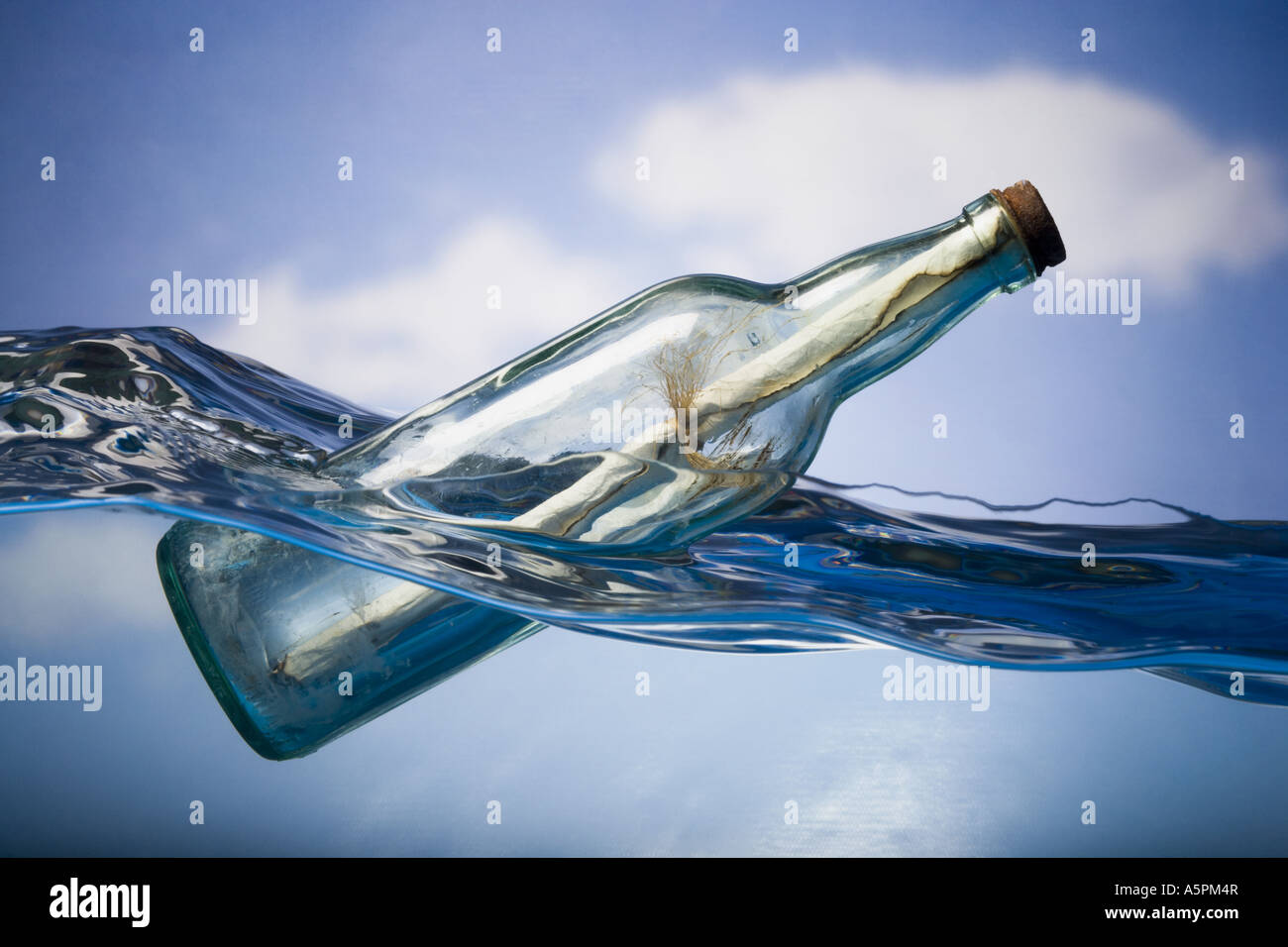 Message in a floating bottle Stock Photo - Alamy