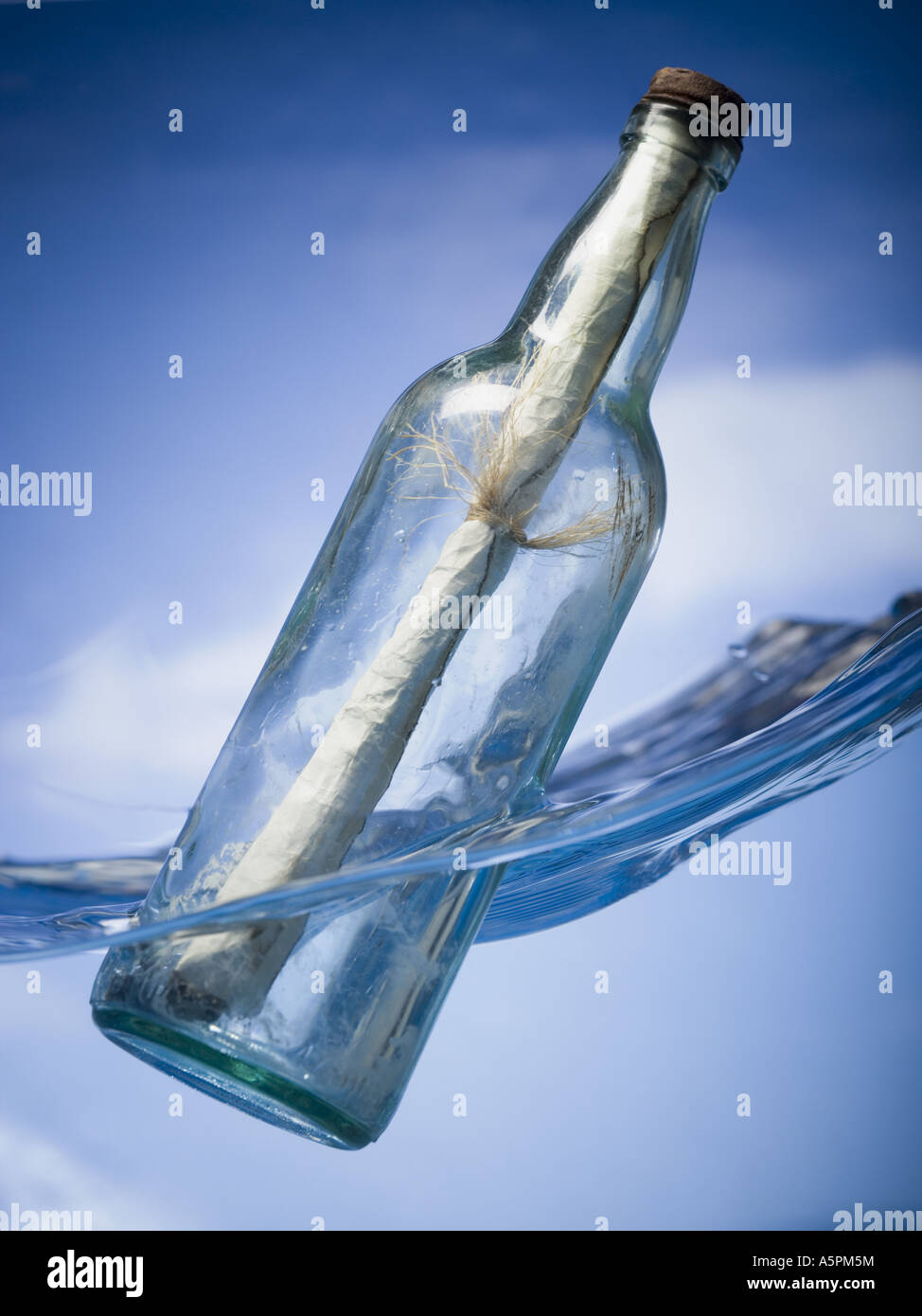 Message in a floating bottle Stock Photo - Alamy